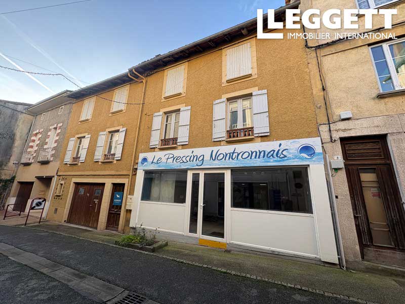 A large commercial property in the centre of Nontron with 4 bedroom ...